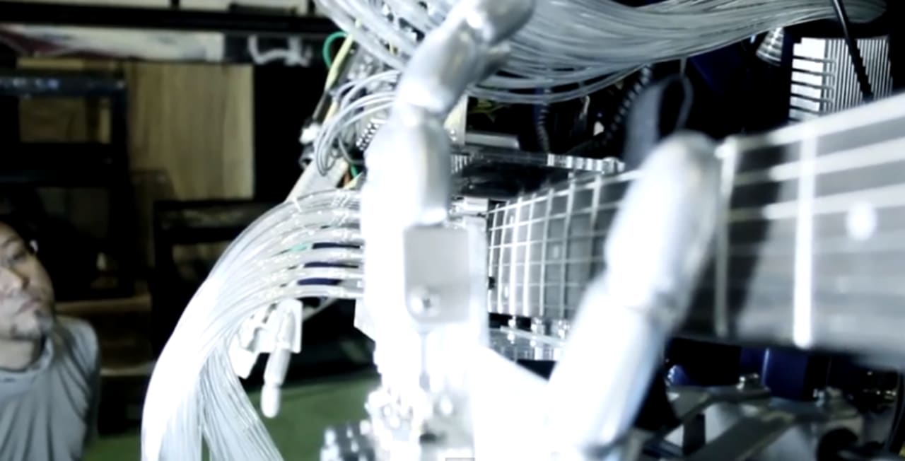 Watch An Insane Robot Band Learn How To Shred On Their Instruments