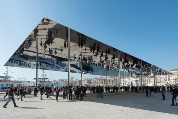 Norman Foster’s Simple Mirrored Pavilion Reflects The Crowds Below