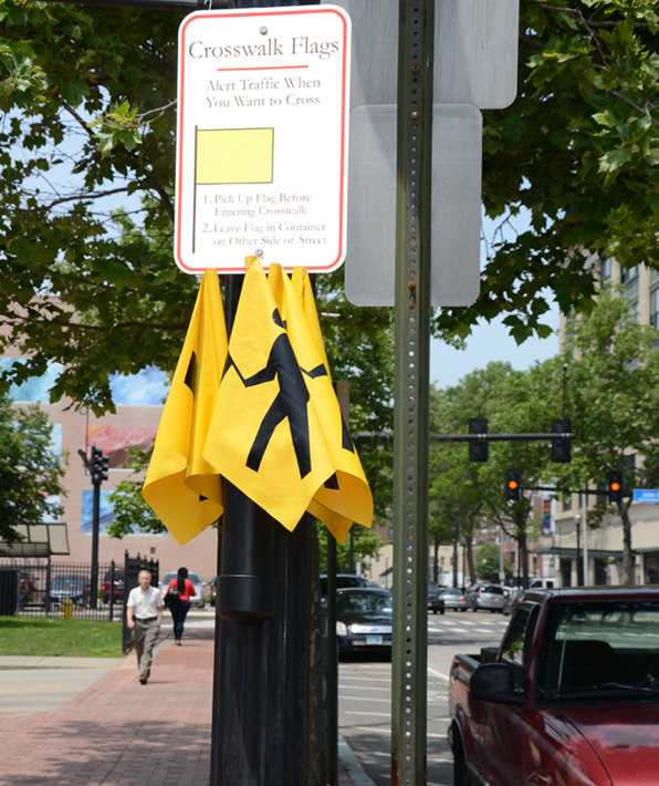 The Latest In Pedestrian Safety? Wave A Flag At Cars And Maybe They Wo