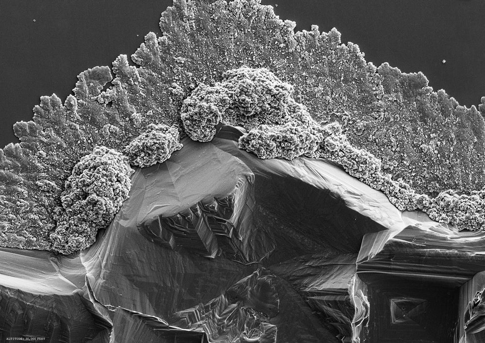 Salt Dissolving Under A Microscope Looks Like The Grand Canyon