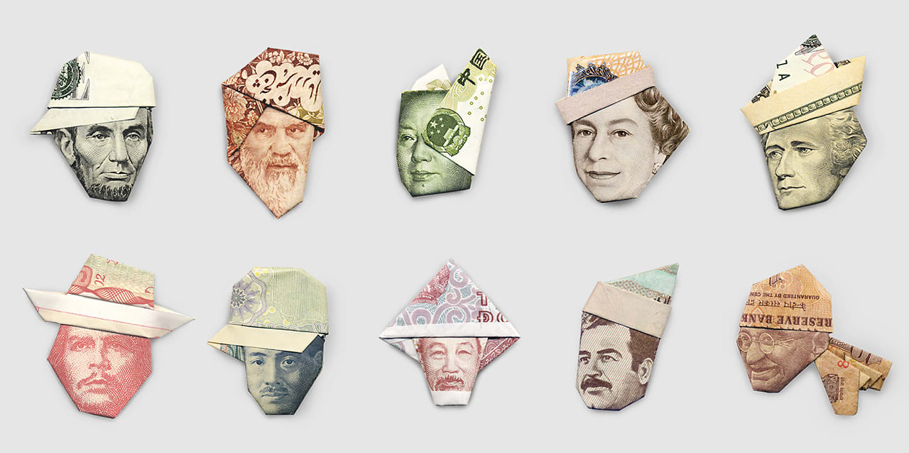Using Origami And World Currency To Make Hats For Gandhi, Lincoln, And