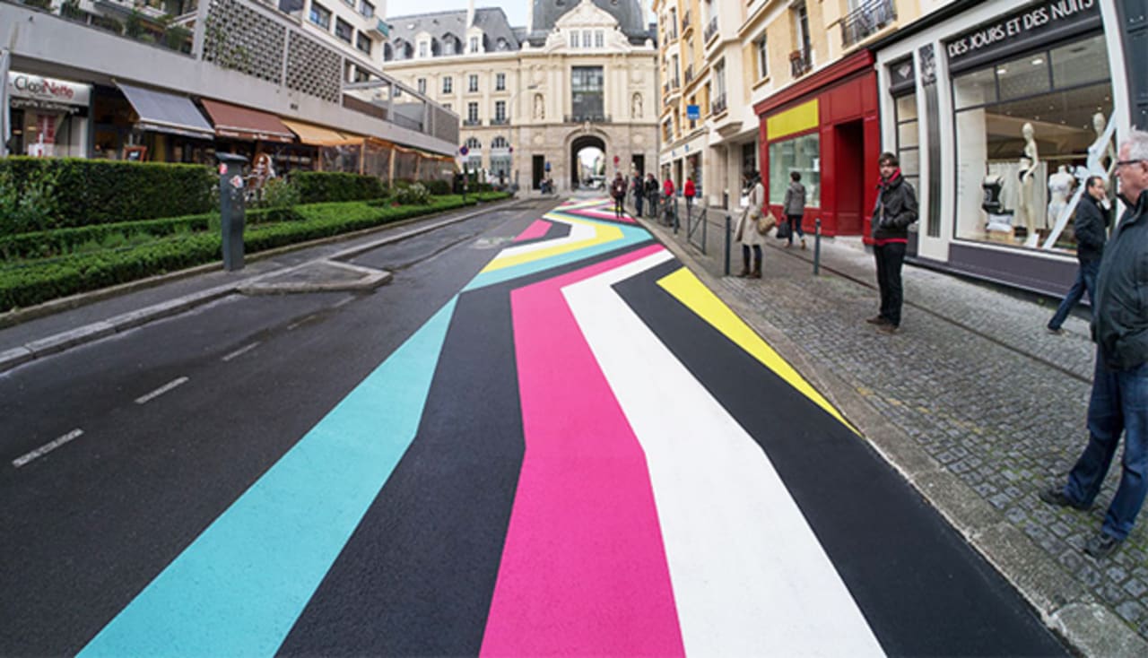 A Pair Of Artists Turn A Dull Roadway Into An Electrifying Canvas
