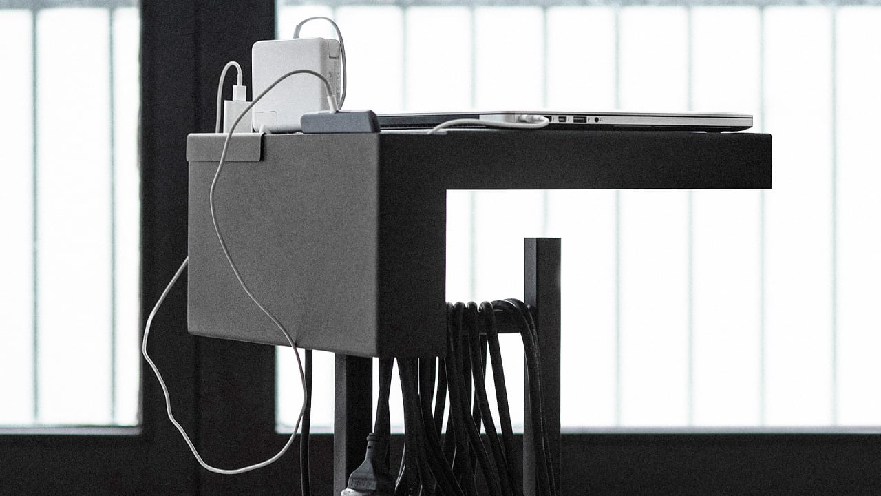 A Designer Table That Embraces Embarrassing Cords