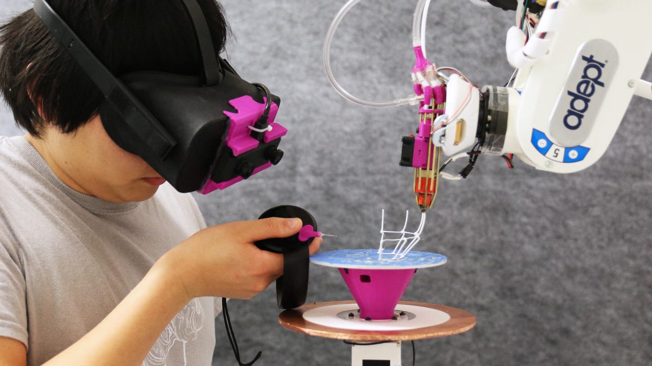 This Designer And Robot Working In Perfect Unison Is The Future Of Mak