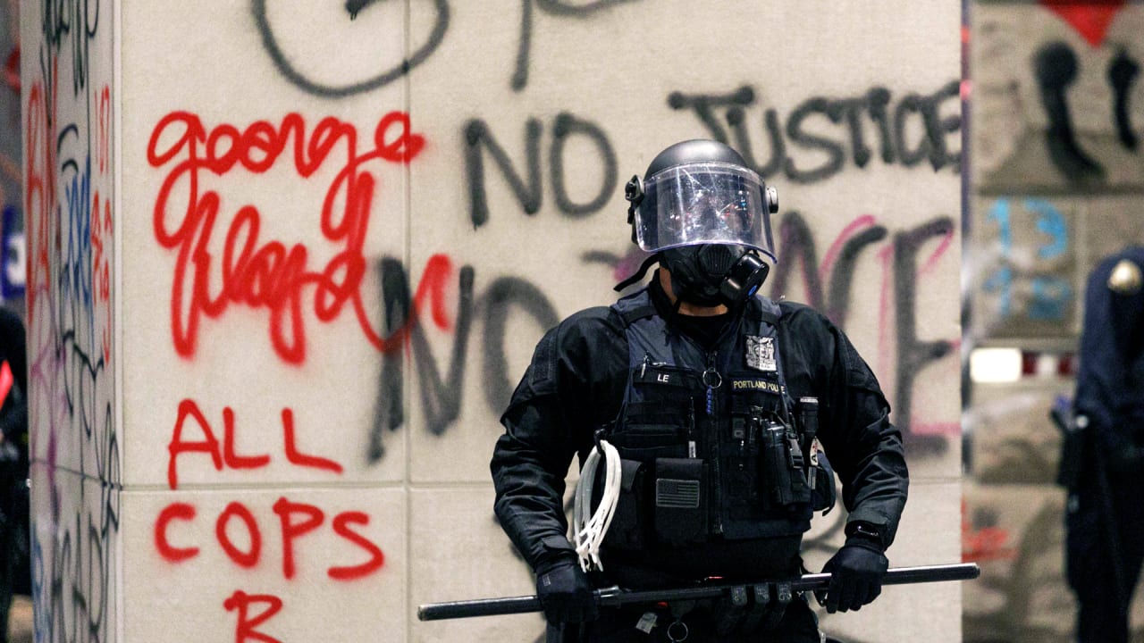 Why outfitting police in military uniforms encourages brutality