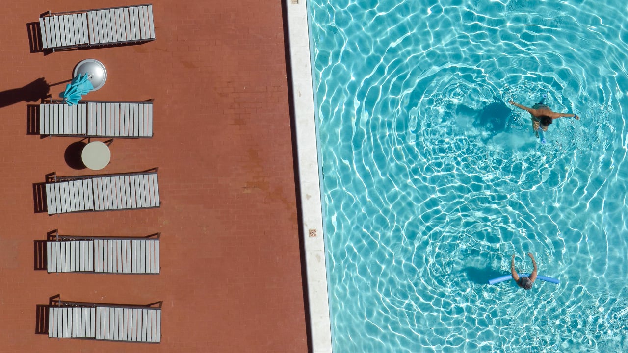 89 swimming pools photographed from above