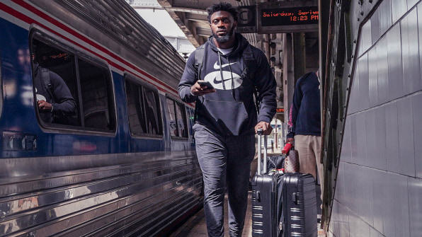Why the Baltimore Ravens rode Amtrak to play the New York Jets and Gia