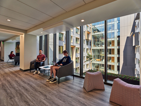 Renovating this 1930s 'doughnut' building meant losing space but gaini