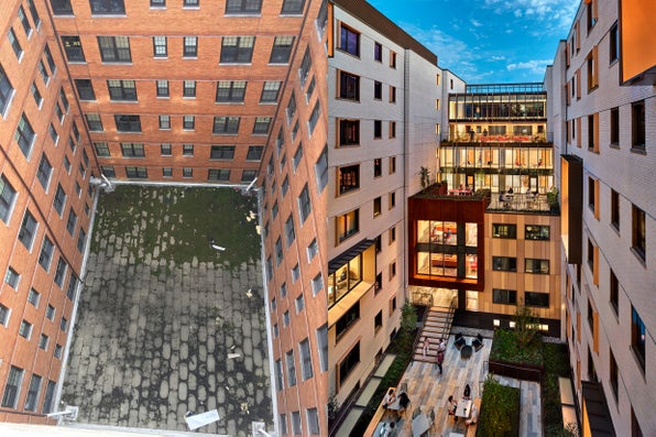 Renovating this 1930s 'doughnut' building meant losing space but gaini